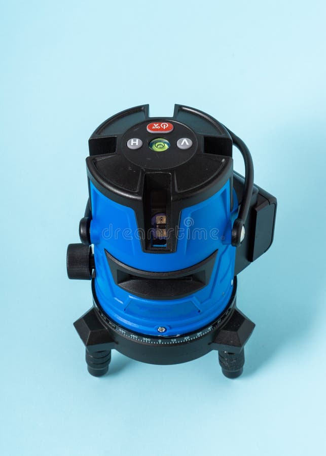 Electronic Laser Level on Light Blue Background Stock Image - Image of ...