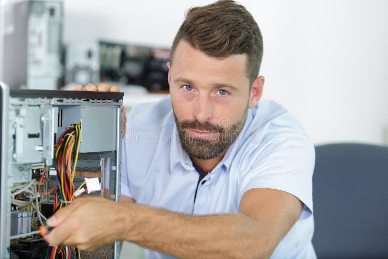 Electronic Male Worker Repairs Pc Stock Image - Image of technical ...