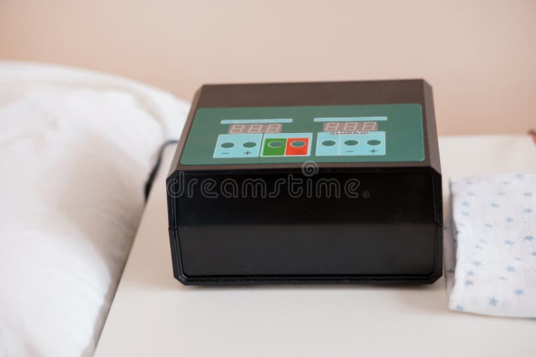 Electronic Medical Device on a Patient S Bedside Table Stock Photo ...