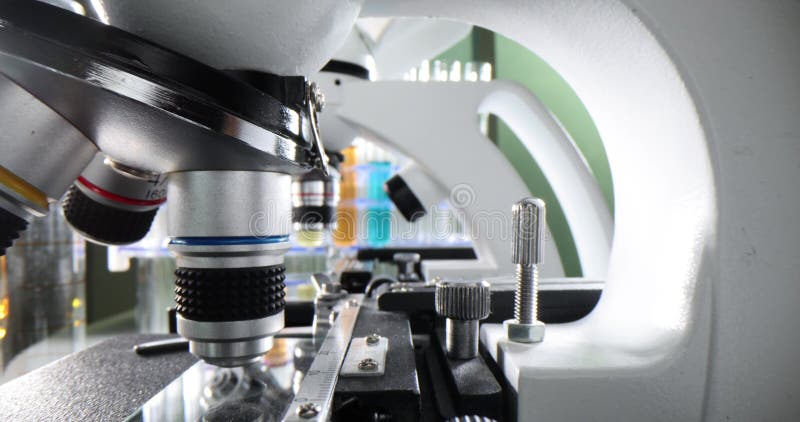 Electronic Microscopes on Table in Laboratory Next To Chemicals Stock ...