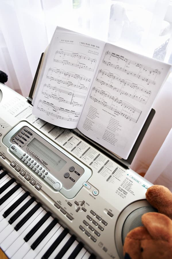 Electronic Piano and Book for Notes Stock Image - Image of luxury ...