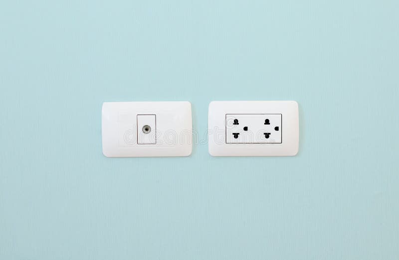 Electronic Plug and Television Cable Outlet on the Blue Wall Stock ...