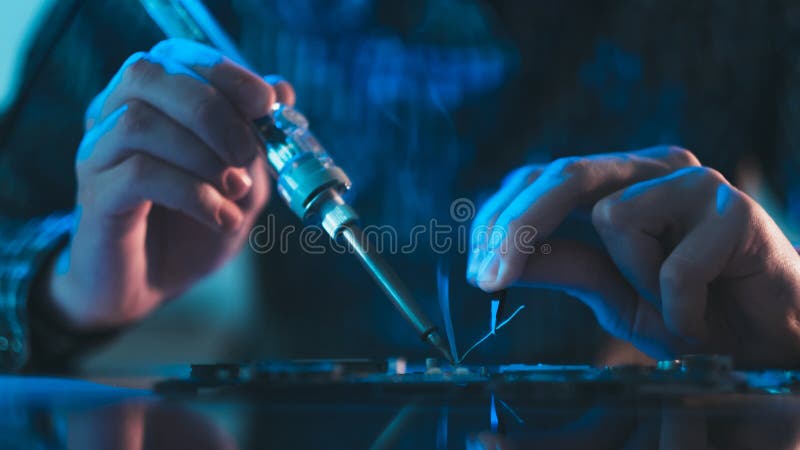 Engineer Soldering Wires To a Circuit Board. Stock Photo - Image of ...