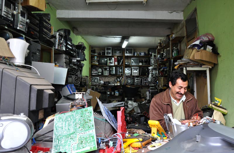 Electronic Repair Man editorial stock photo. Image of repairing - 22539678