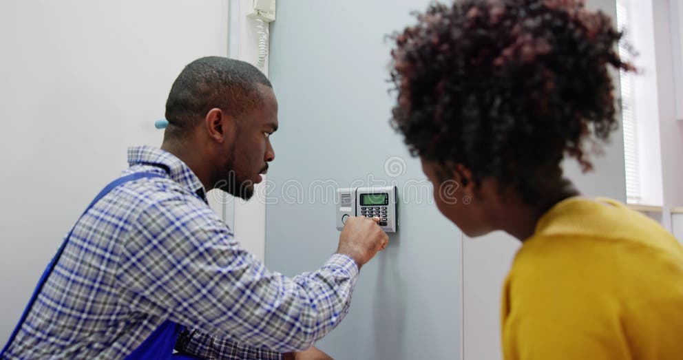 Electronic Security Alarm System Install. Professional Installer Stock ...