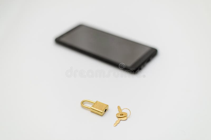 Electronic Security and Data Protection Concept. Mobile Phone and Key ...