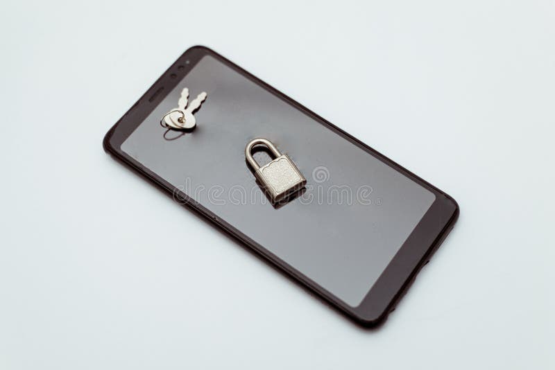 Electronic Security and Data Protection Concept. Mobile Phone and Key ...