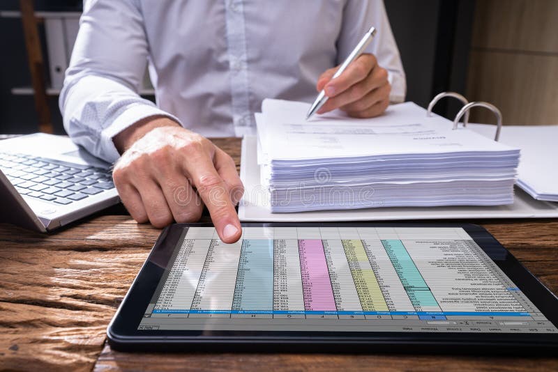 Electronic Spreadsheet Analyst or Auditor Using Software Stock Photo ... Electronic Spreadsheet Analyst or Auditor Using Software Stock Photo ...