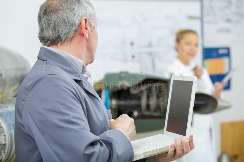 Electronic Technician Man at Repair Shop with Laptop Stock Image ...