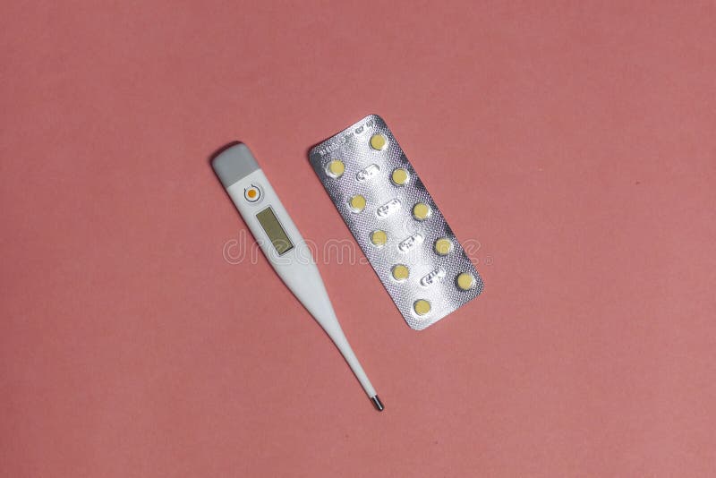 Electronic Thermometer and Pill on the Background Stock Image - Image ...