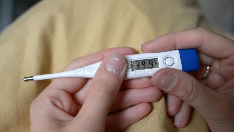 Electronic Thermometer Shows a Temperature of 39.9 Degrees Celsius ...