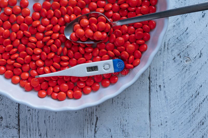 An Electronic Thermometer with a Temperature Mark of 39.7 in a Large ...