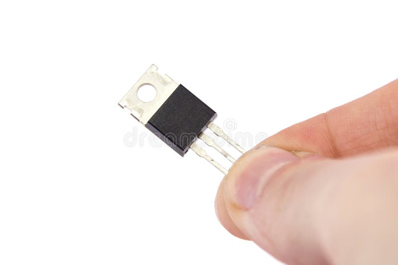 Electronic Transistor in Hand Close-up on White Stock Image - Image of ...