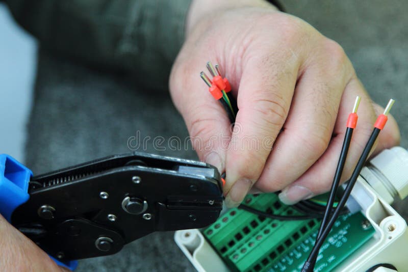 Electronic worker hands stock image. Image of electrician - 190270005