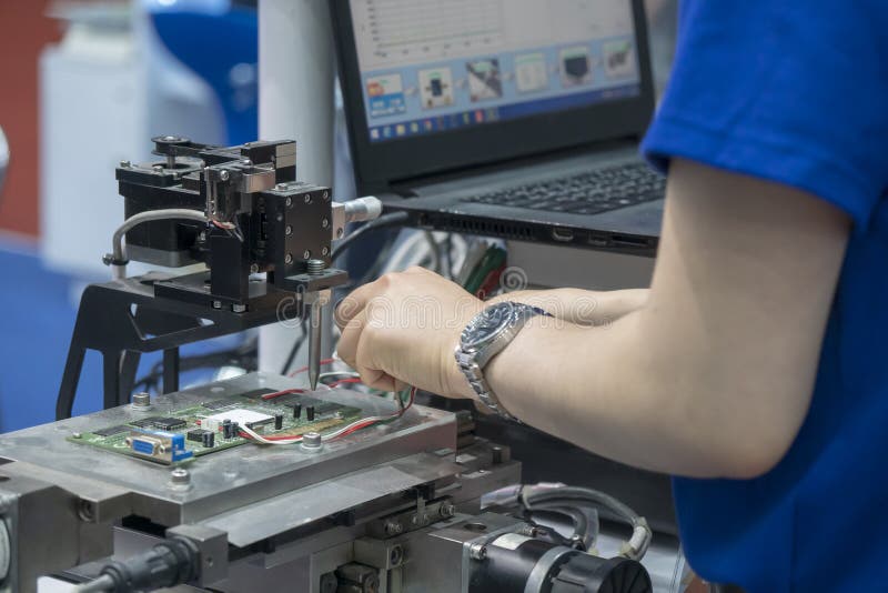 The Electronics Board Testing Process by Operator. Stock Photo - Image ...