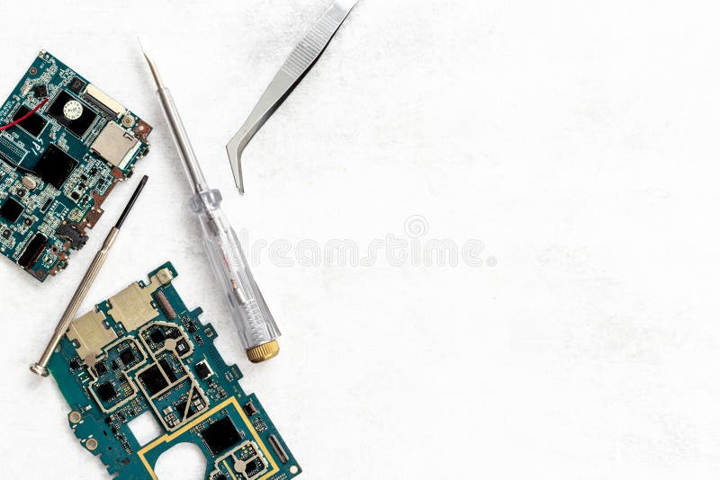 Electronics Checkup - Circuit Board with Microchips and Tools, Top View ...