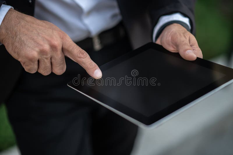 Close Up of a Mans Hand Touching the Sensor Screen of a Tablet Stock ...