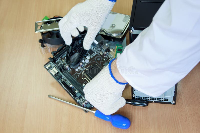 Electronics Engineer Assembles a Personal Computer. Stock Image - Image ...