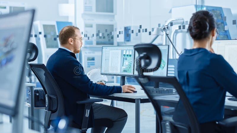 Electronics Factory: Male Electrical Engineer Holds PCB Prototype ...