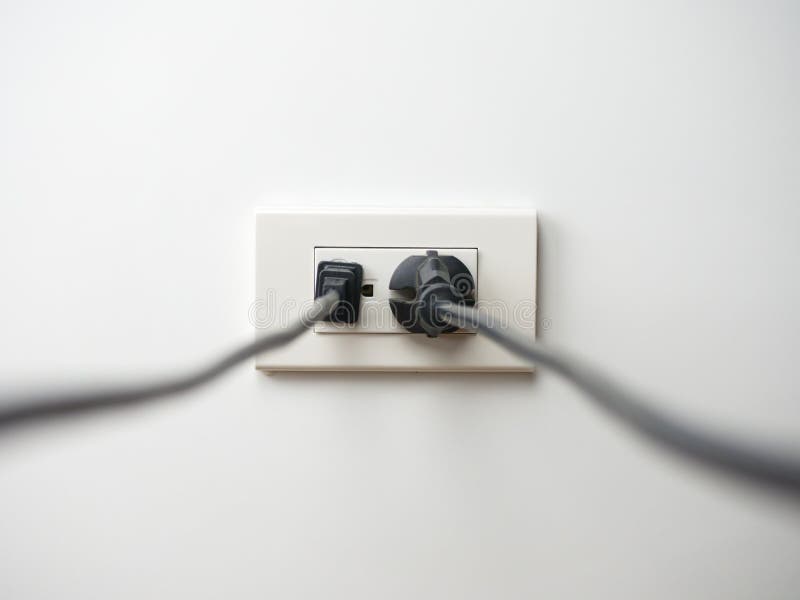 Electronics Plugged in To the Socket Stock Photo - Image of mobile ...