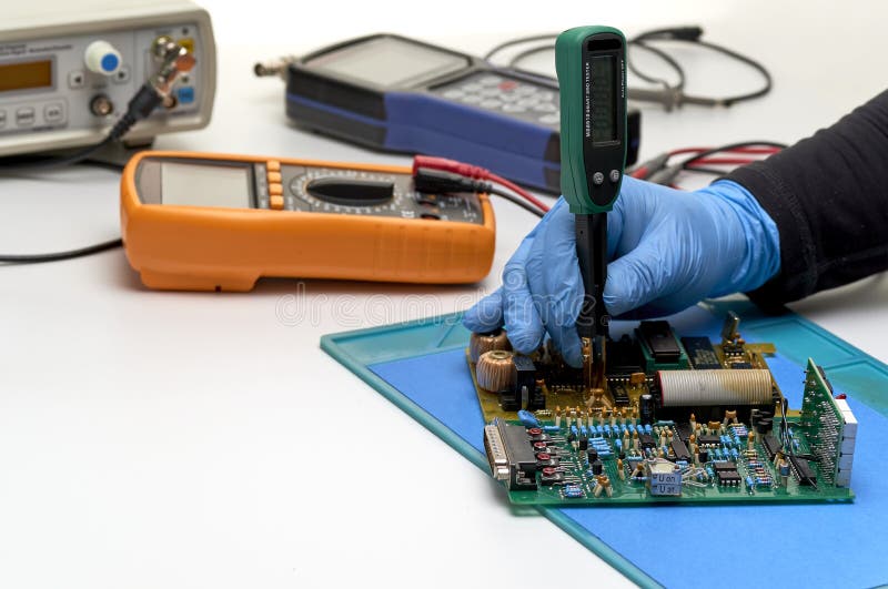 Electronics Repair Service-the Master Checks the Electronic Unit and ...