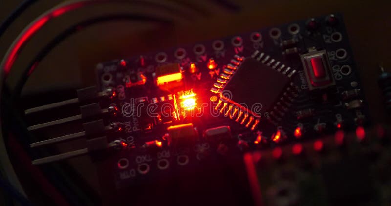 Electronic Circuit with Burning Red LED Light Bulb in Ultraviolet Light ...