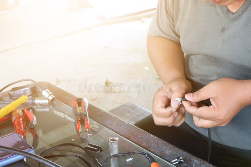 Electronics Technician Men are Repairing Electrical Appliances ...