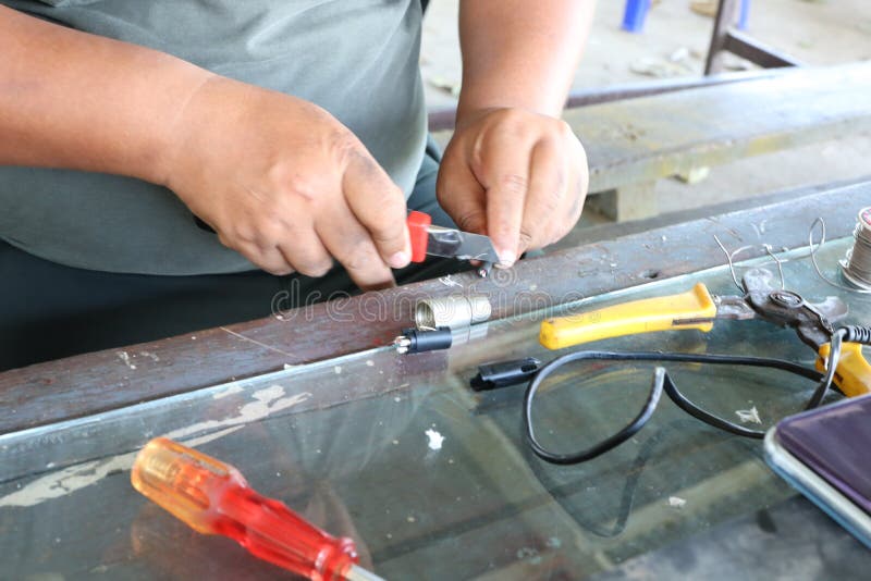 Electronics Technician Men are Repairing Electrical Appliances ...
