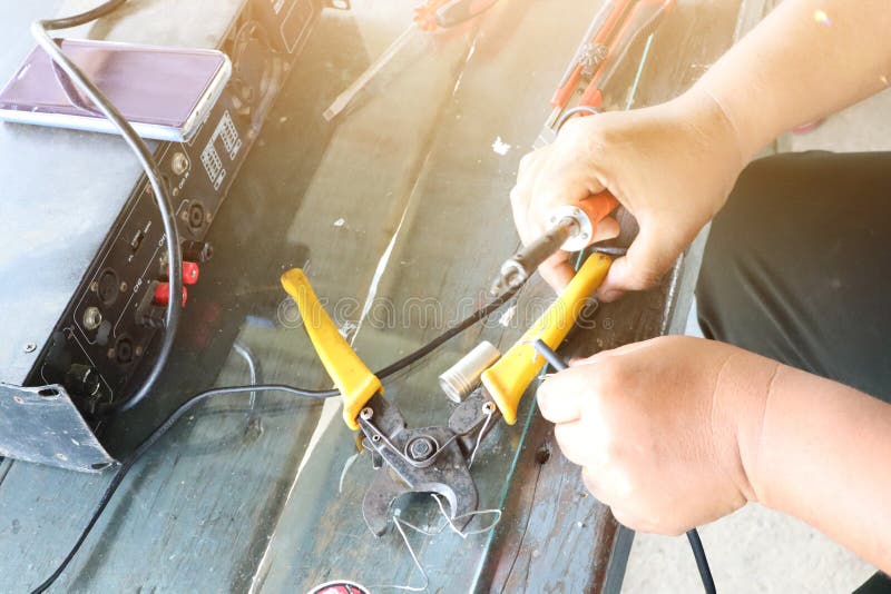 Electronics Technician Men are Repairing Electrical Appliances ...