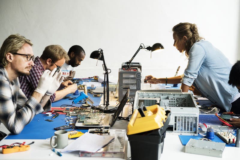 Electronics Technicians are Working on Computer Parts Stock Photo ...
