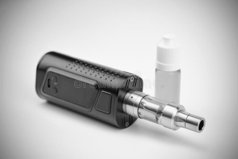 E - Cigarette for Vaping , Technical Devices.the Liquid in the Bottle ...