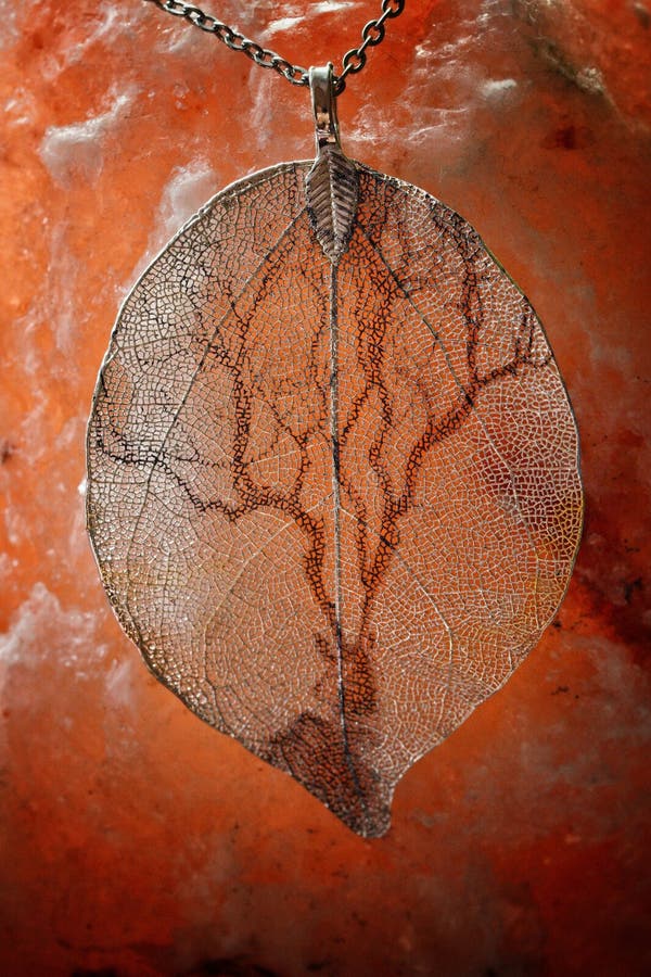 Electroplated Natural Leaf on a Salt Lamp Stock Photo - Image of ...