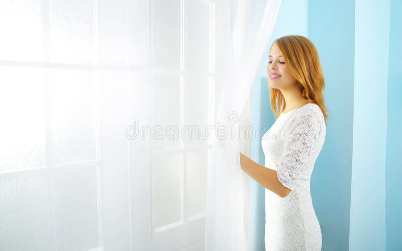 Girl at window. stock image. Image of peering, indoors - 2284513
