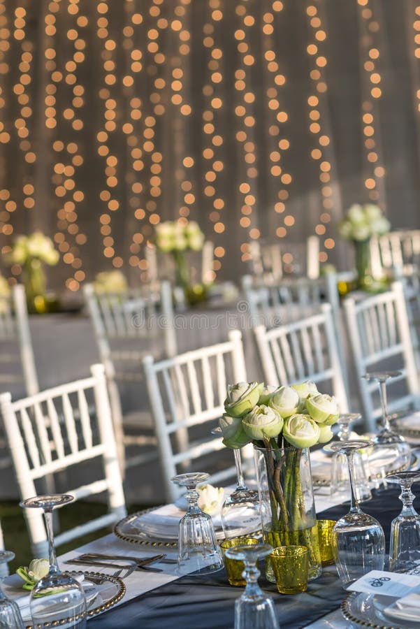 Elegance Table Set Up with Lotus Flowers Stock Image - Image of metal ...