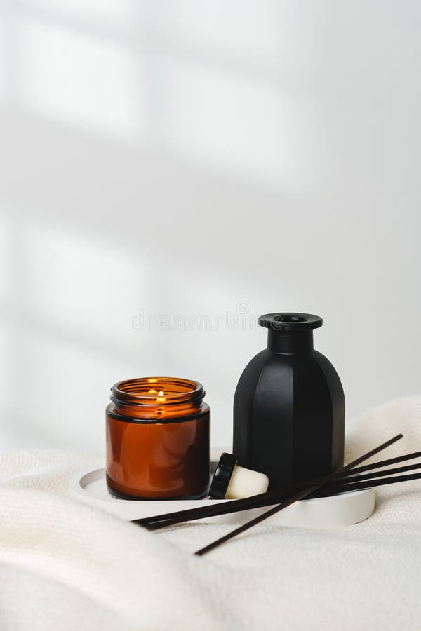 Elegant Aroma Diffuser with Reed Sticks and Scented Candle on White ...