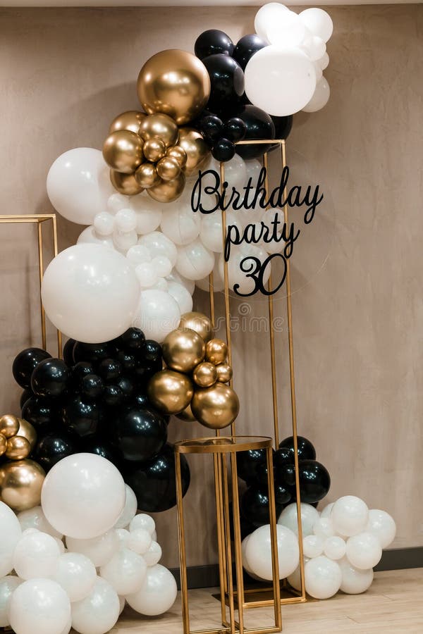 Elegant Balloon Arch for a 30th Birthday Celebration Stock Photo ...