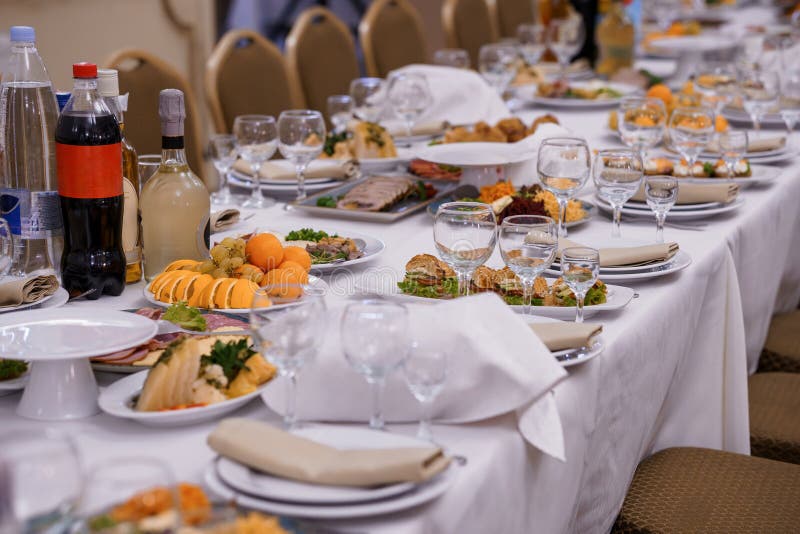 Elegant Banquet Table Set with Assorted Dishes and Drinks Stock Photo ...