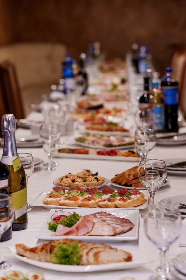 Elegant Banquet Table Set for a Culinary Feast Stock Photo - Image of ...