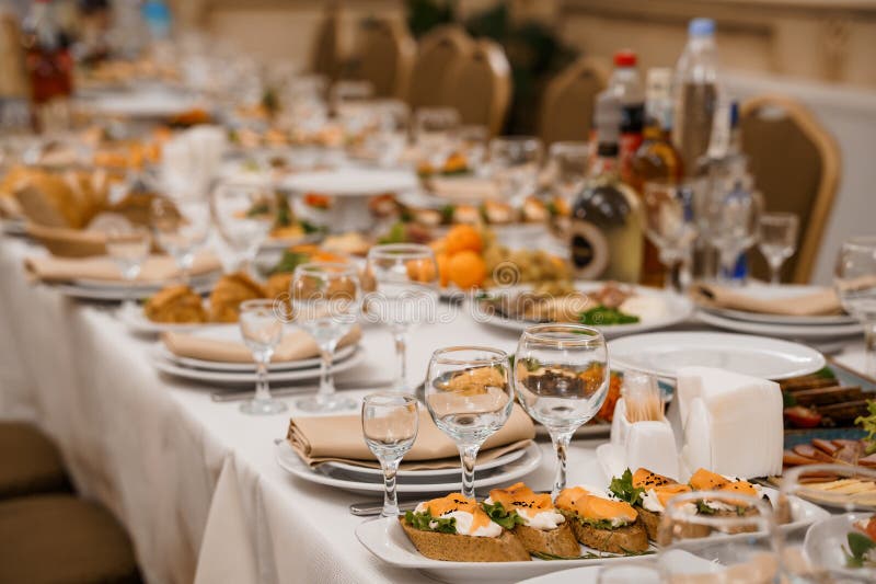Elegant Banquet Table Set for a Lavish Feast with Assorted Dishes and ...