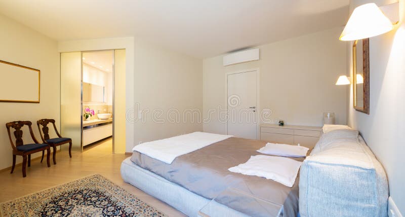 Elegant Bedroom in Modern Villa Stock Image - Image of room, inside ...