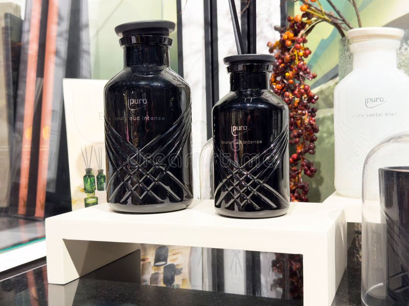 Elegant Black Diffuser Bottles Display with Decorative Details ...