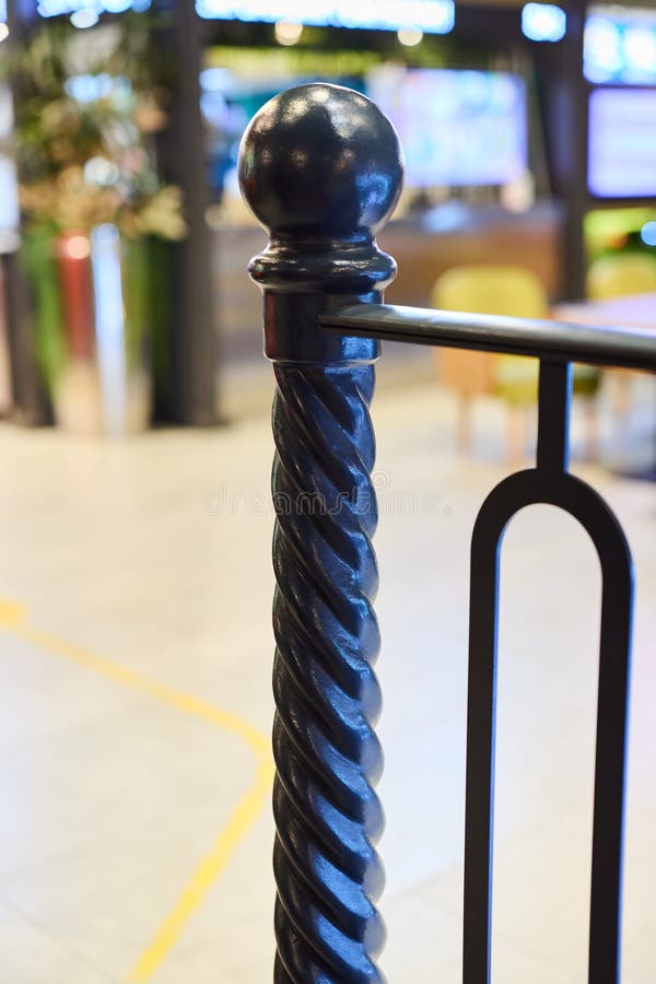 The Elegant Black Twisted Railing Post Amidst a Chic and Modern ...