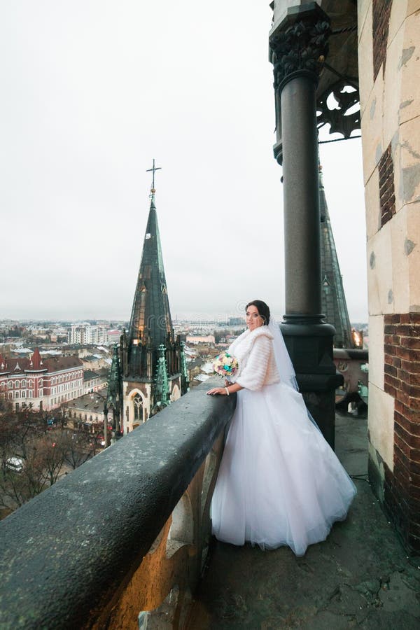 Elegant Bride Poses on the Tower Balcony of Old Gothic Cathedral Stock ...