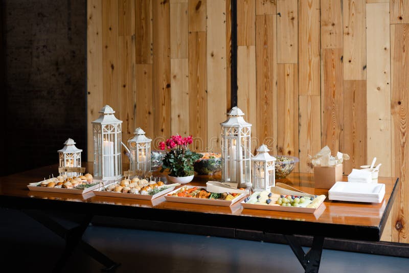 Elegant Buffet Setup Featuring Assorted Dishes and Decorative Lanterns ...