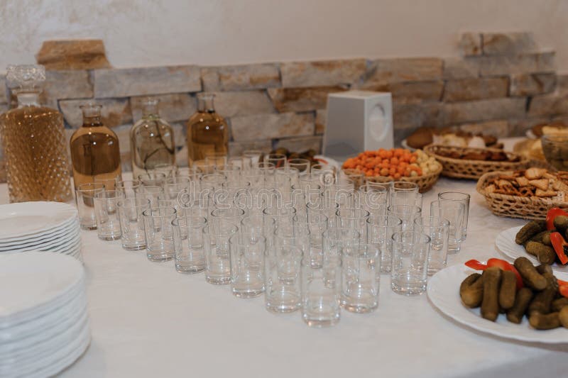 Elegant Buffet Table Display Featuring Glasses, Bottles, and Assorted ...