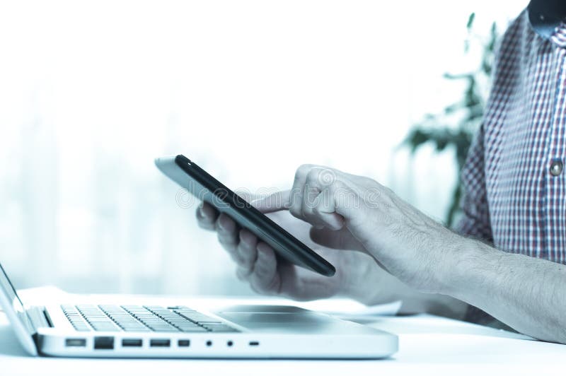 Elegant Business Multitasking Multimedia Man Using Devices at Home ...