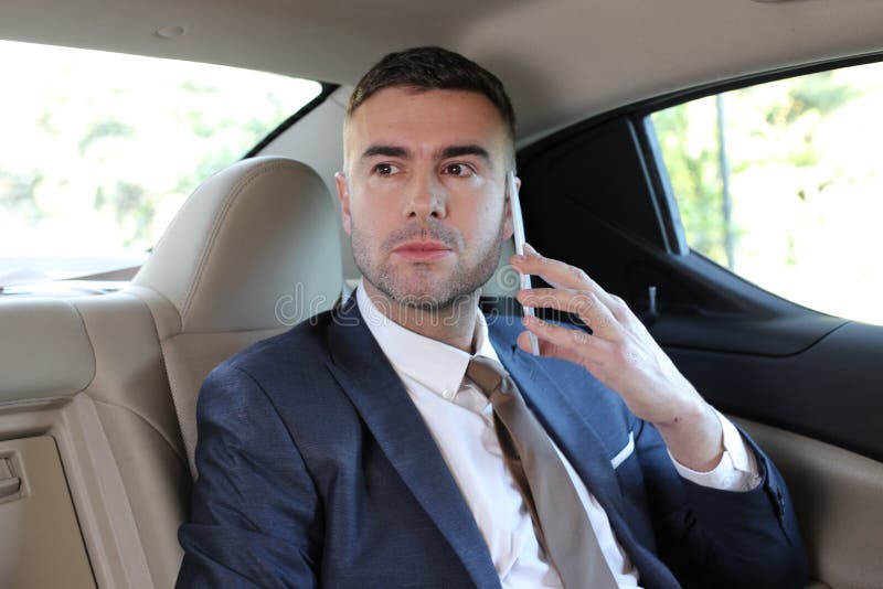 Elegant Car Passenger Using Phone Stock Photo - Image of device ...