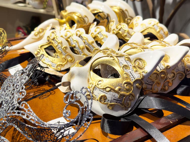 Elegant Cat Masquerade Masks with Musical Note Design on Display Table ...