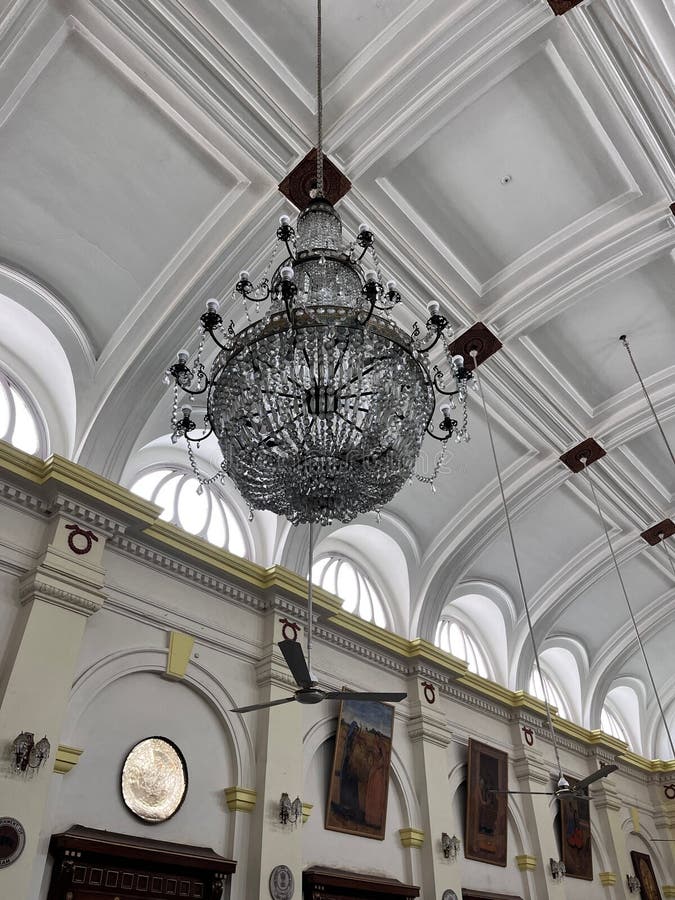 Elegant Chandelier Hanging from a Vaulted Ceiling in a Building ...