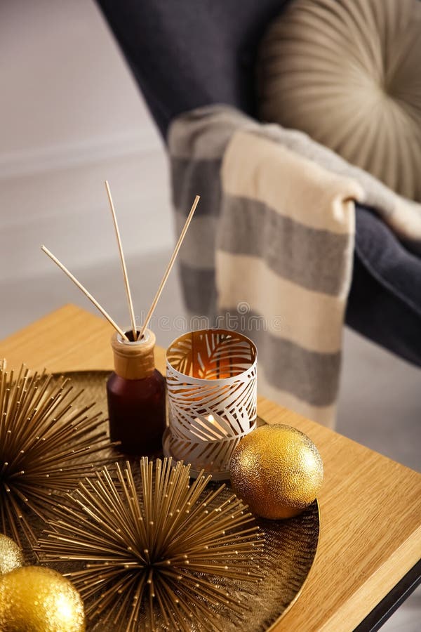 Elegant Christmas Decor and Reed Diffuser on Table Indoors. Interior ...